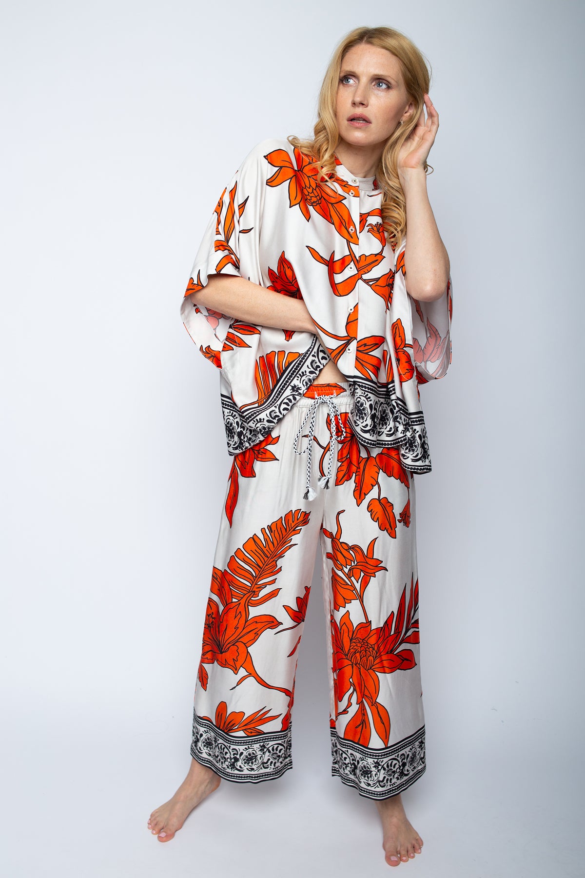 EMILY Orange & Black Floral Trousers – Women’s Fashion by Katriona